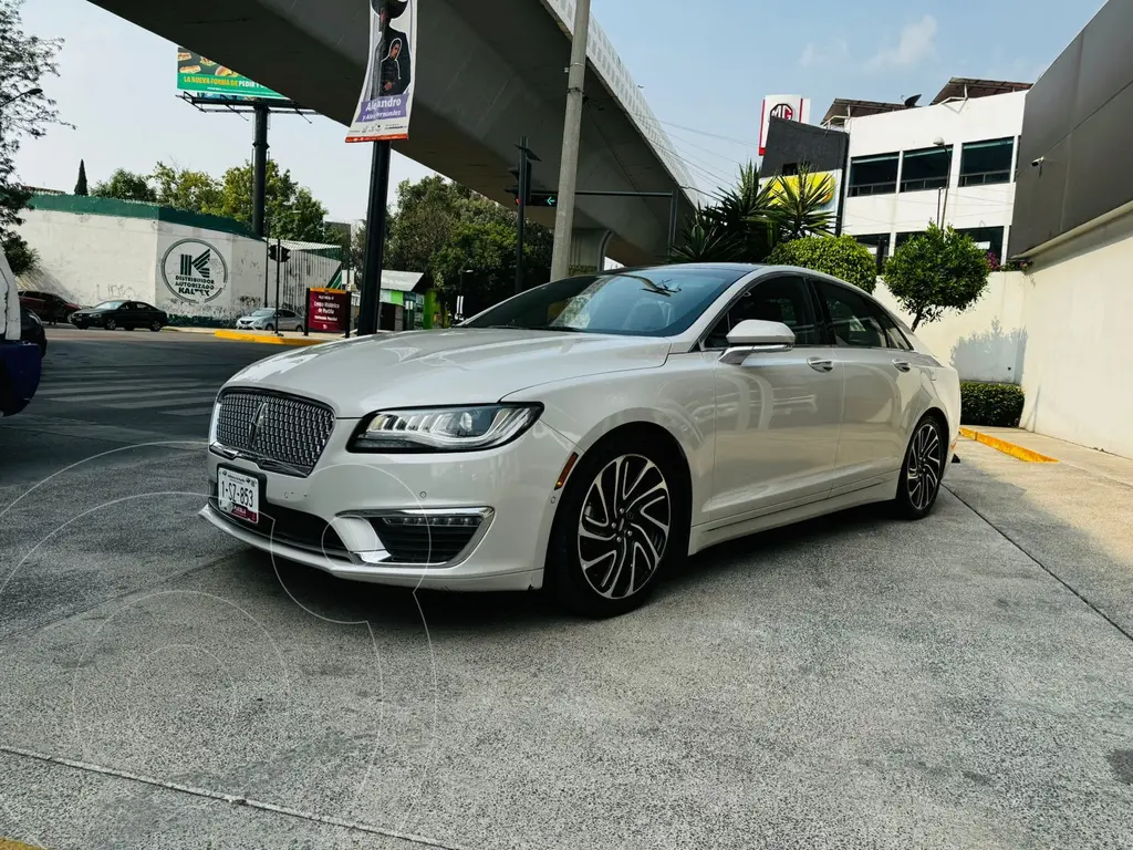 Lincoln MKZ Reserve usado (2020) color coral claro precio $570,000