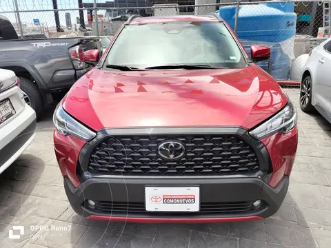 Toyota Corolla Cross HEV LE usado (2023) color Rojo Cobrizo precio $560,000